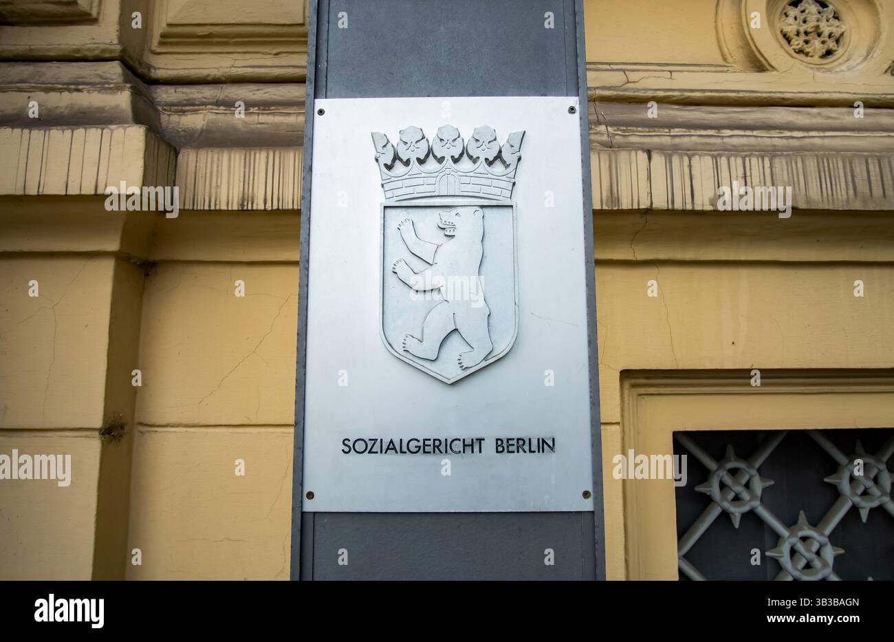 Close-up of the Sozialgericht Berlin sign on a historic building facade ...