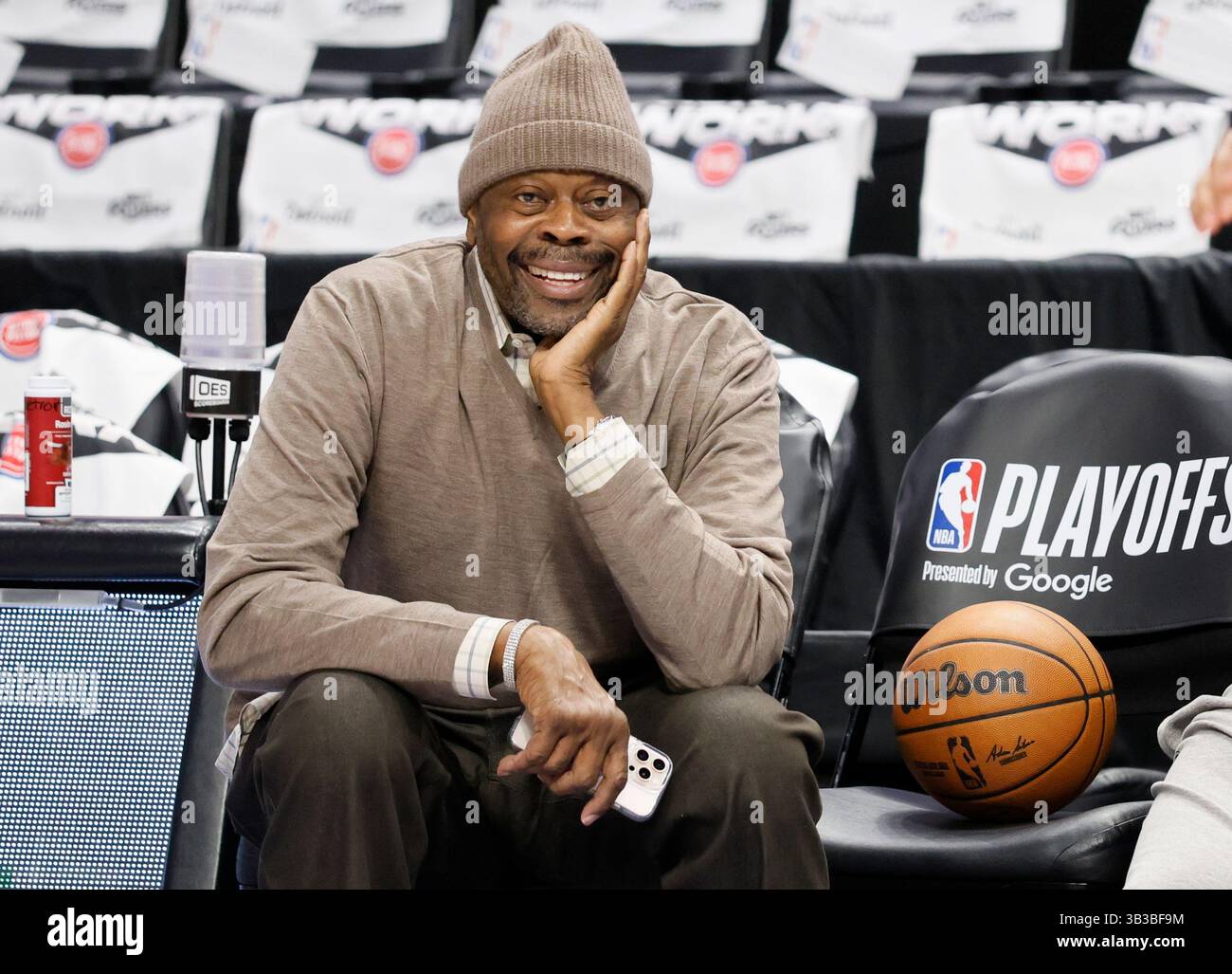 Former New York Knicks center Patrick Ewing watches players warm up for Game 4 of an NBA ...
