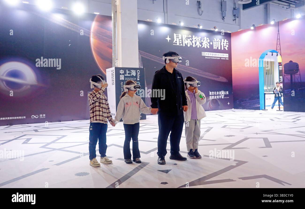 SHANGHAI, CHINA - APRIL 27, 2025 - Parents led their children to the ...