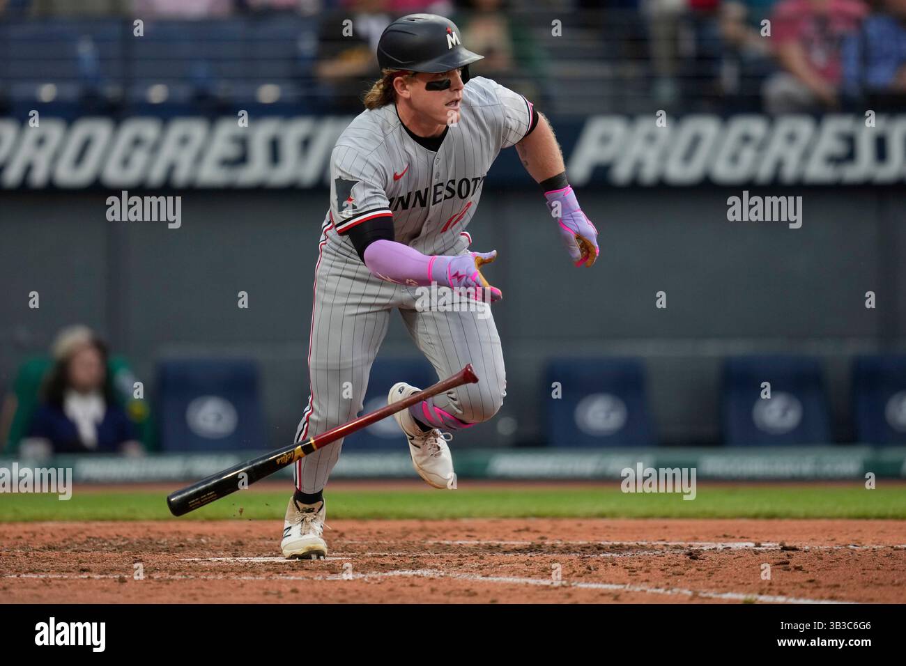 Minnesota Twins' Harrison Bader runs to first base after hitting a ...
