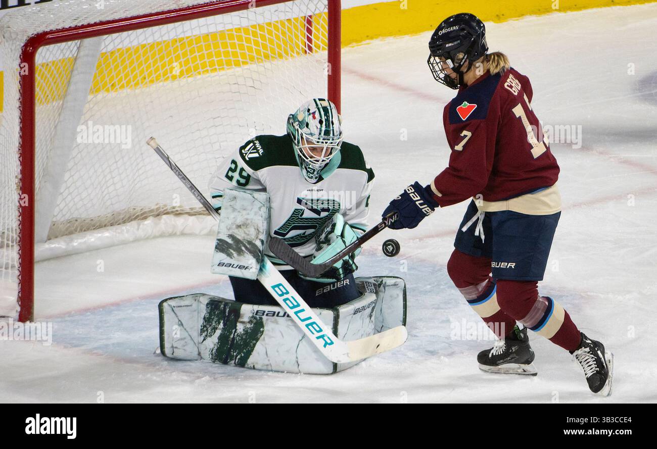 Boston Fleet goalie Klara Peslarova, left, blocks the puck as Montreal ...