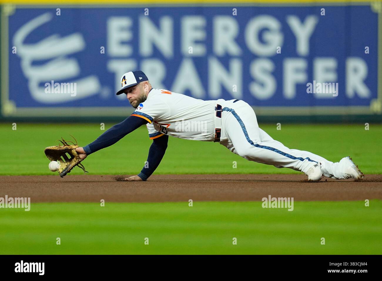 Houston Astros first baseman Christian Walker dives to field a ground ...