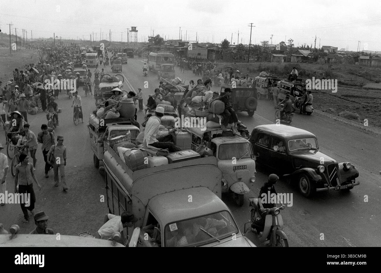 FILE- Refugees fleeing the advance of communist forces pour into Saigon ...