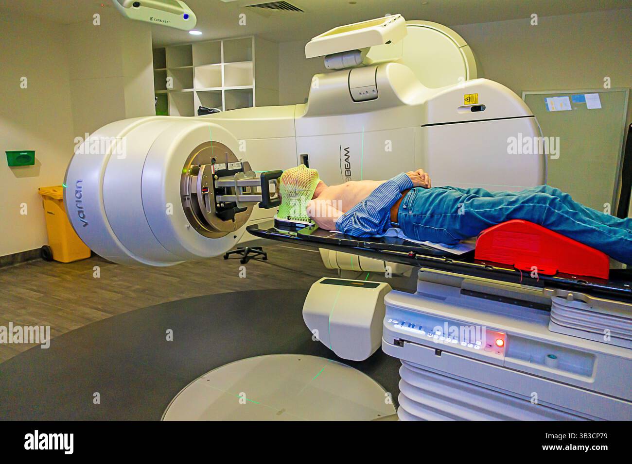 Male Cancer Patient ready for treatment on a TrueBeam radiation therapy machine Stock Photo - Alamy