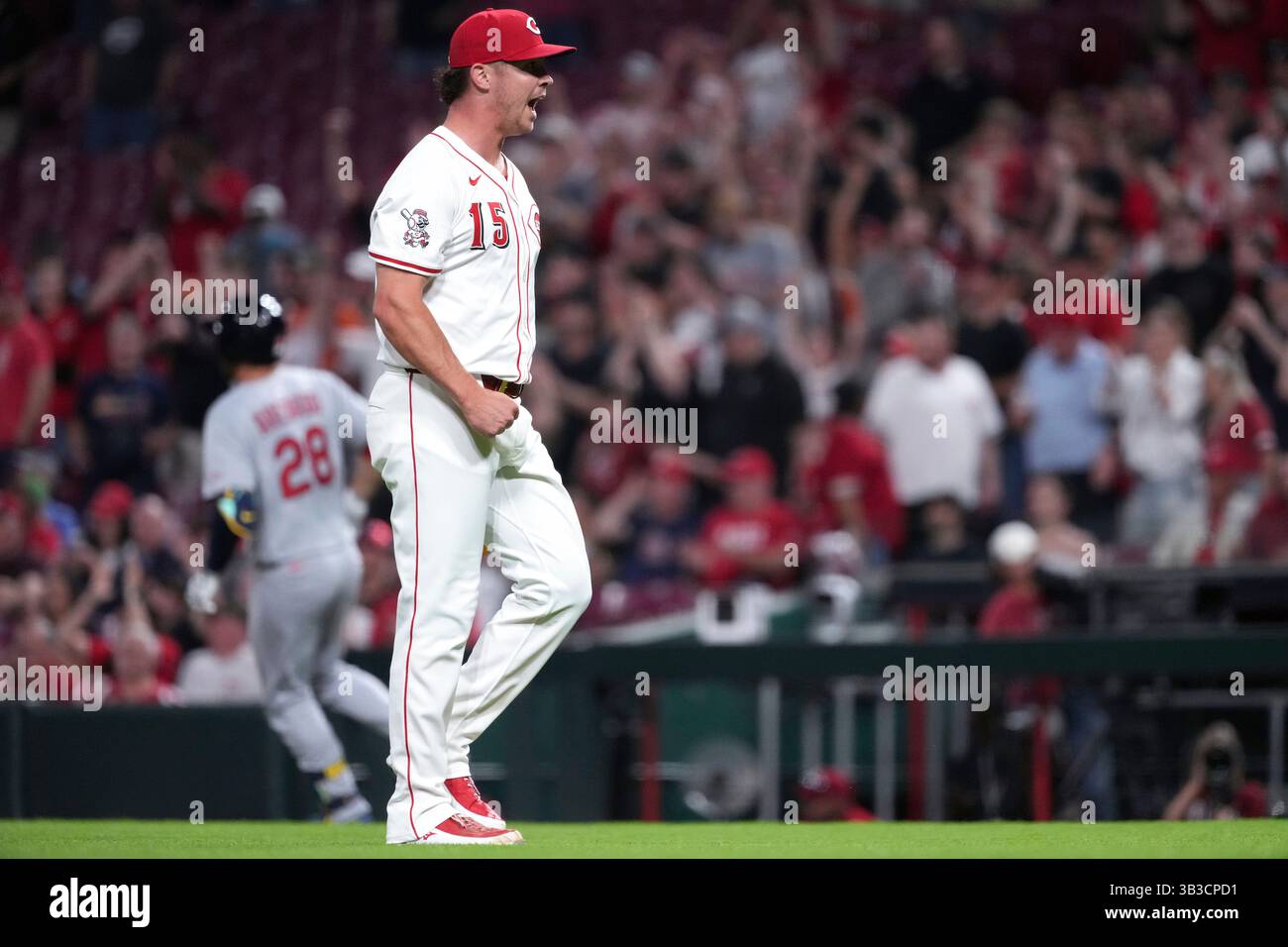 Cincinnati Reds' Emilio Pagán (15) reacts after a completing a save in ...