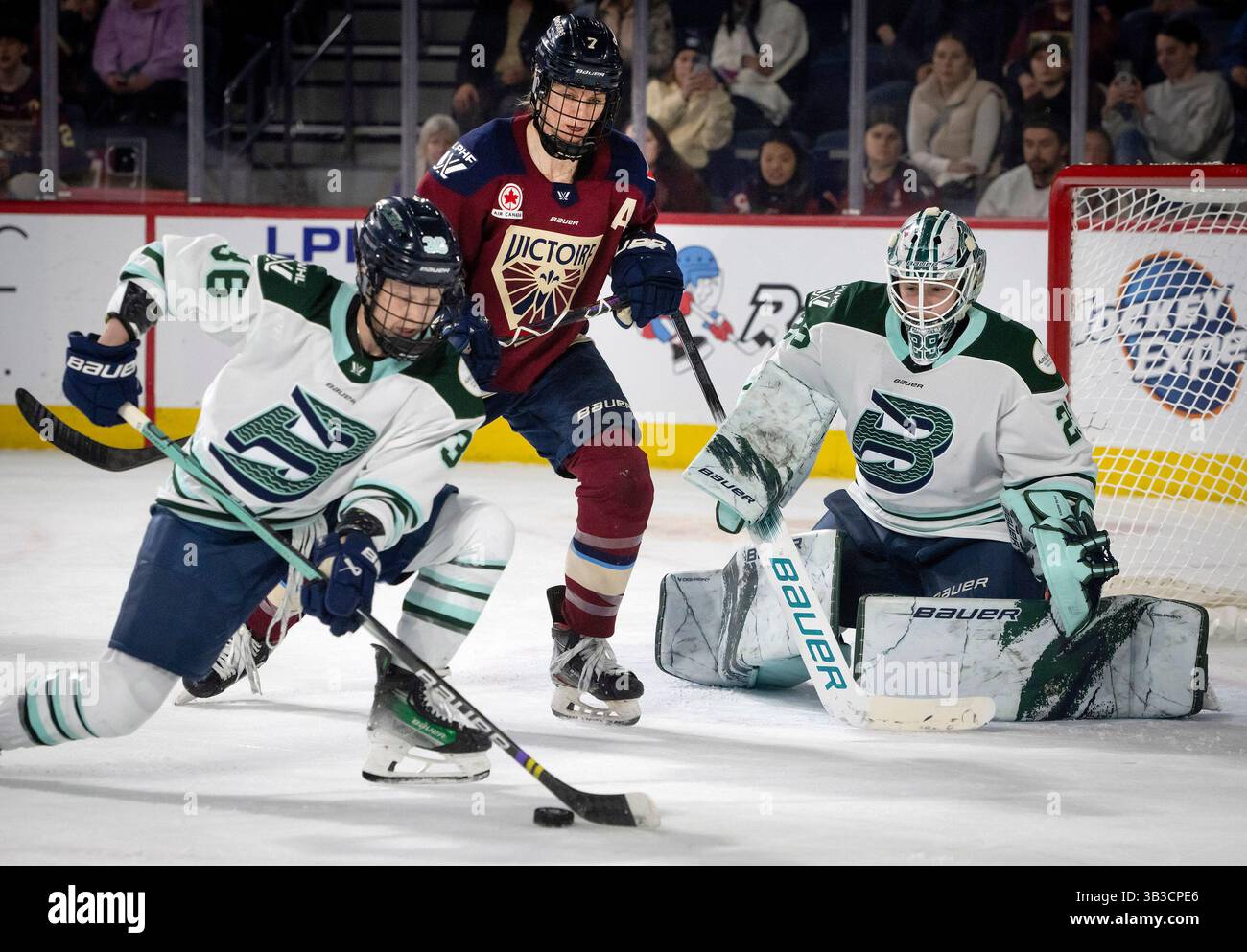 Boston Fleet's Loren Gabel (36) blocks a shot against her goalie Klara ...