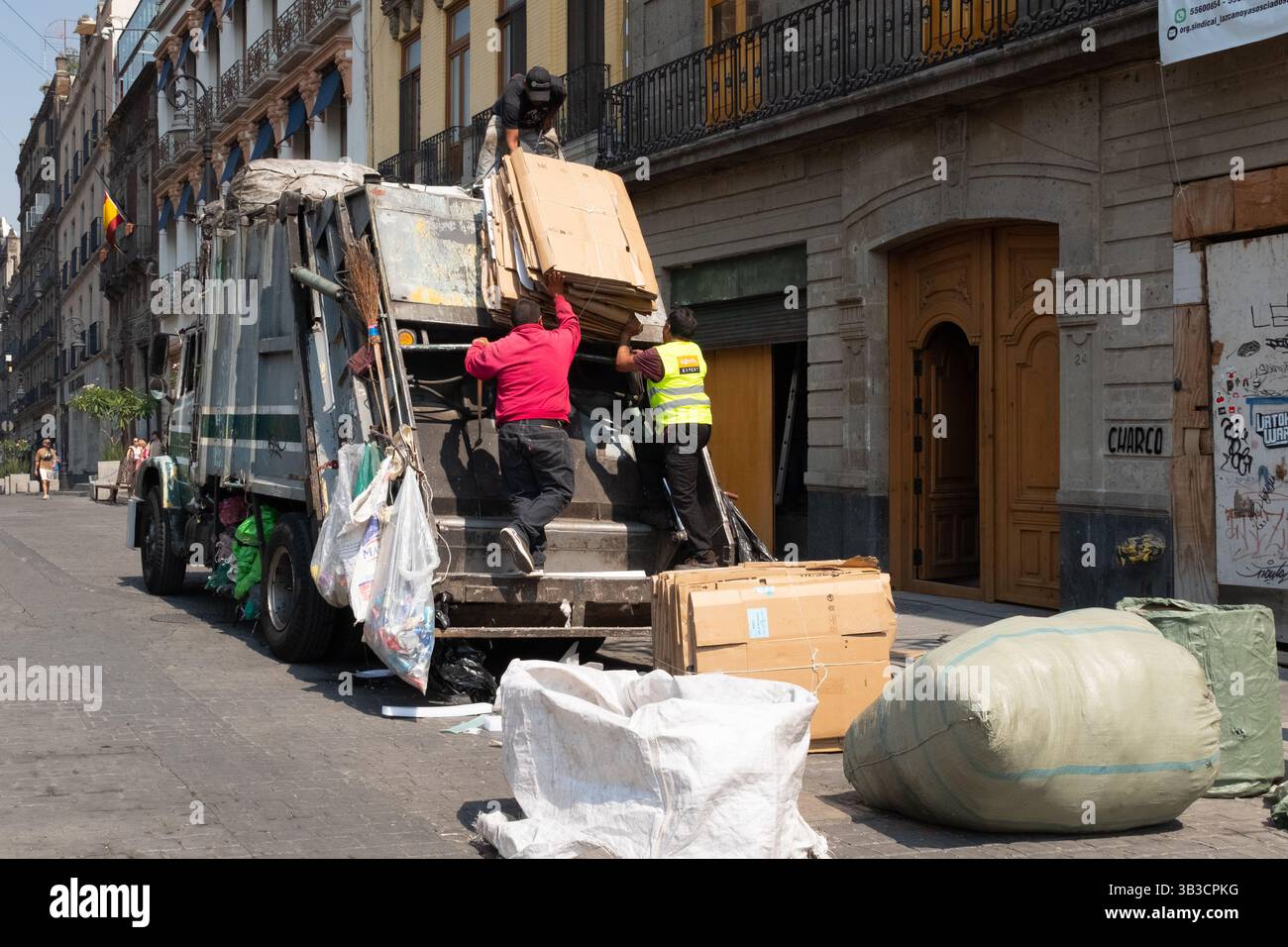 Garbage removal, downtown historical Mexico city, Mexico Stock Photo ...