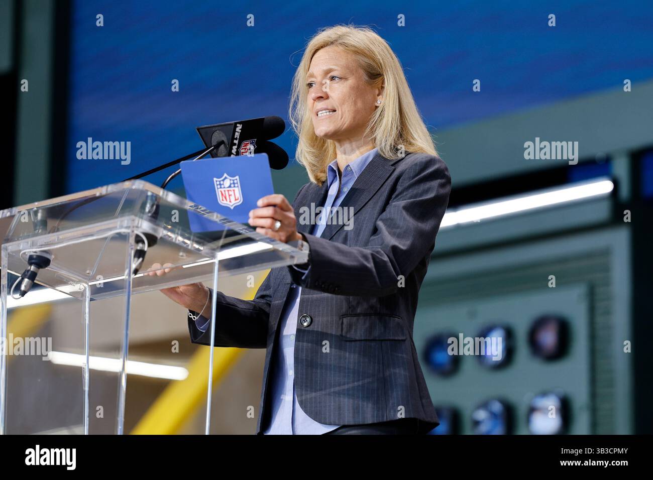 NFL Chief Football Administrative Officer Dawn Aponte is seen on stage ...