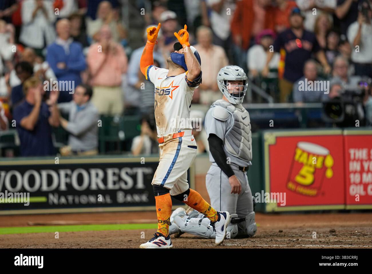 Houston Astros' Jose Altuve, left, celebrates after hitting a two-run ...