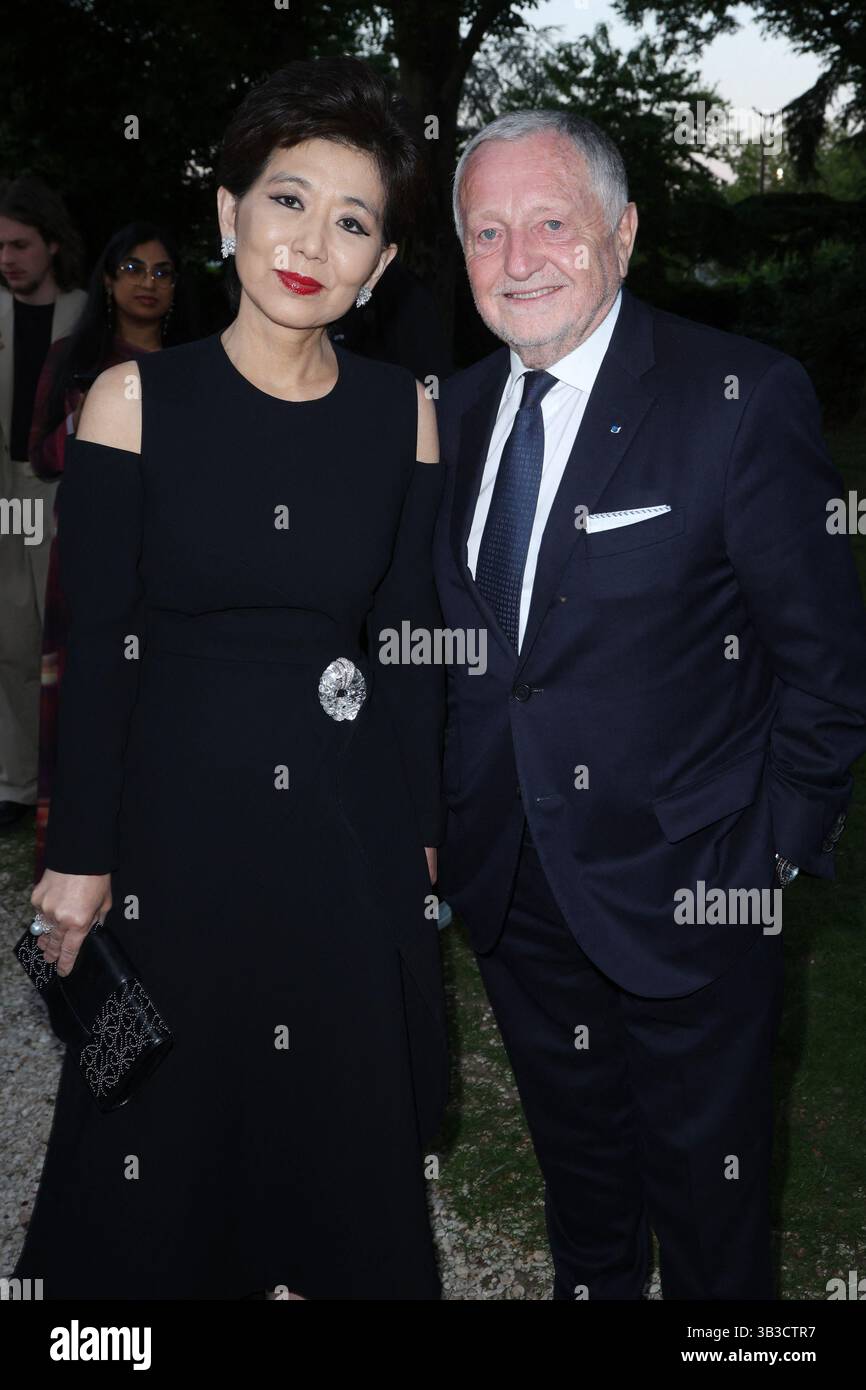 Paris, France. 28th Apr, 2025. Michele Kang and Jean-Michel Aulas ...