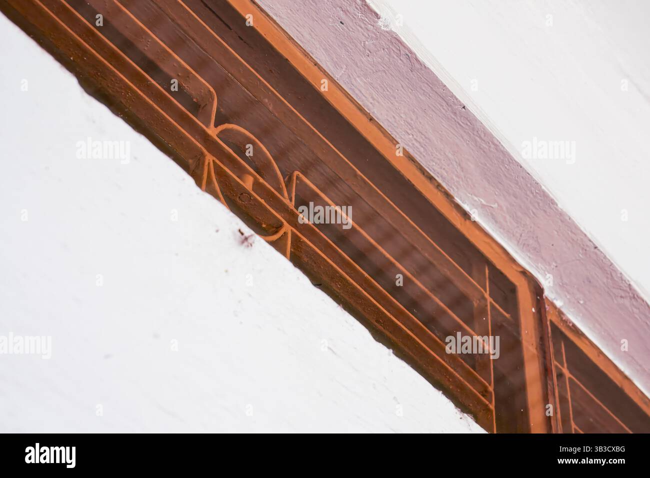 Worn metal window frame against a weathered white wall Stock Photo - Alamy