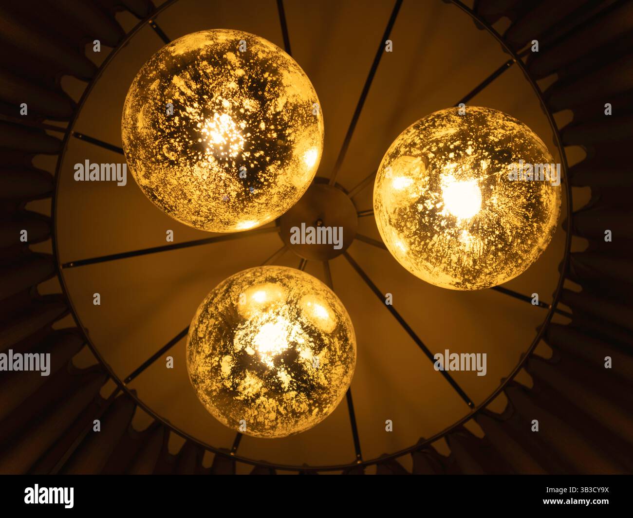 Three textured round ceiling light lamps Stock Photo - Alamy