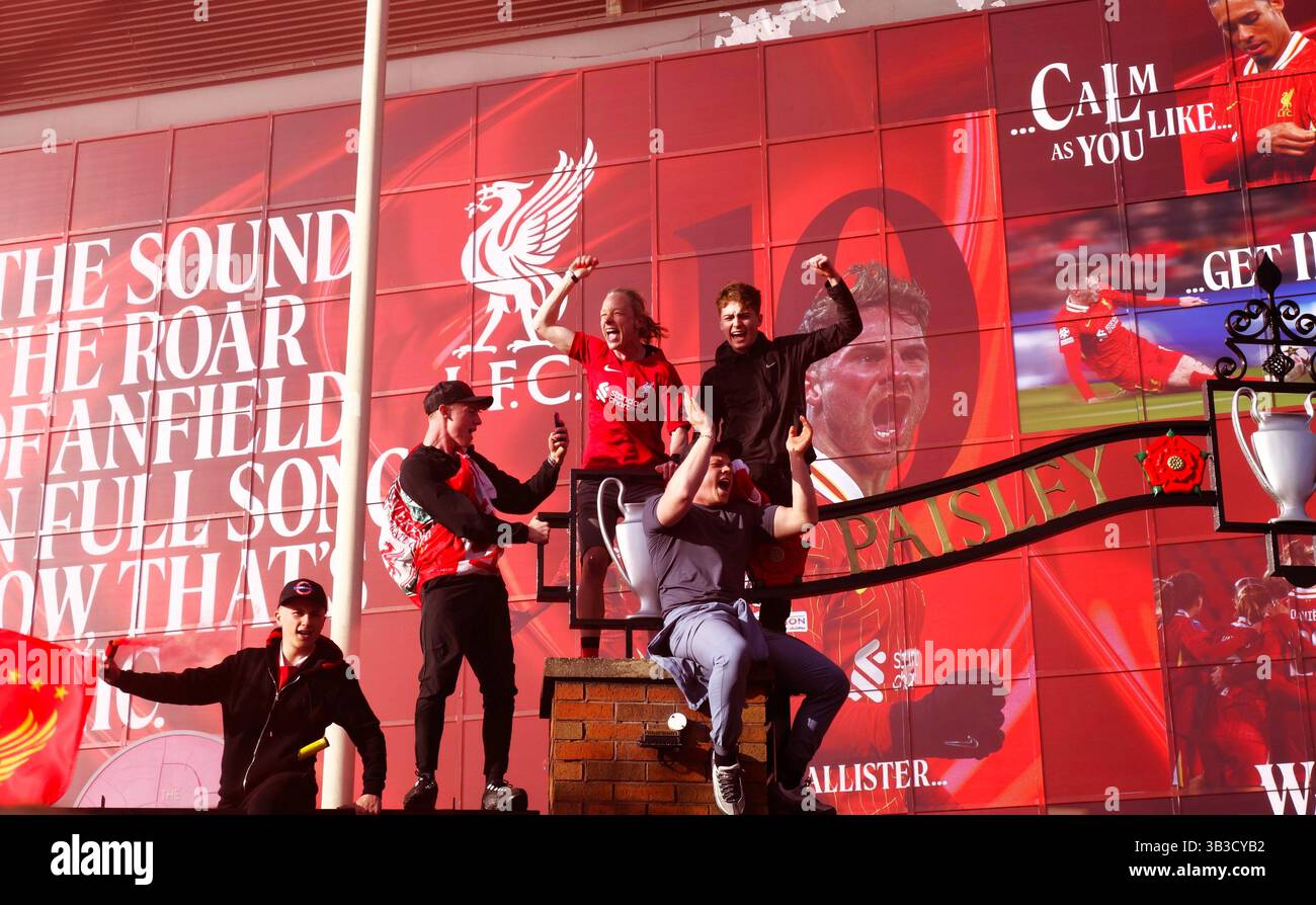 Liverpool fans celebrate winning the Premier League title outside ...