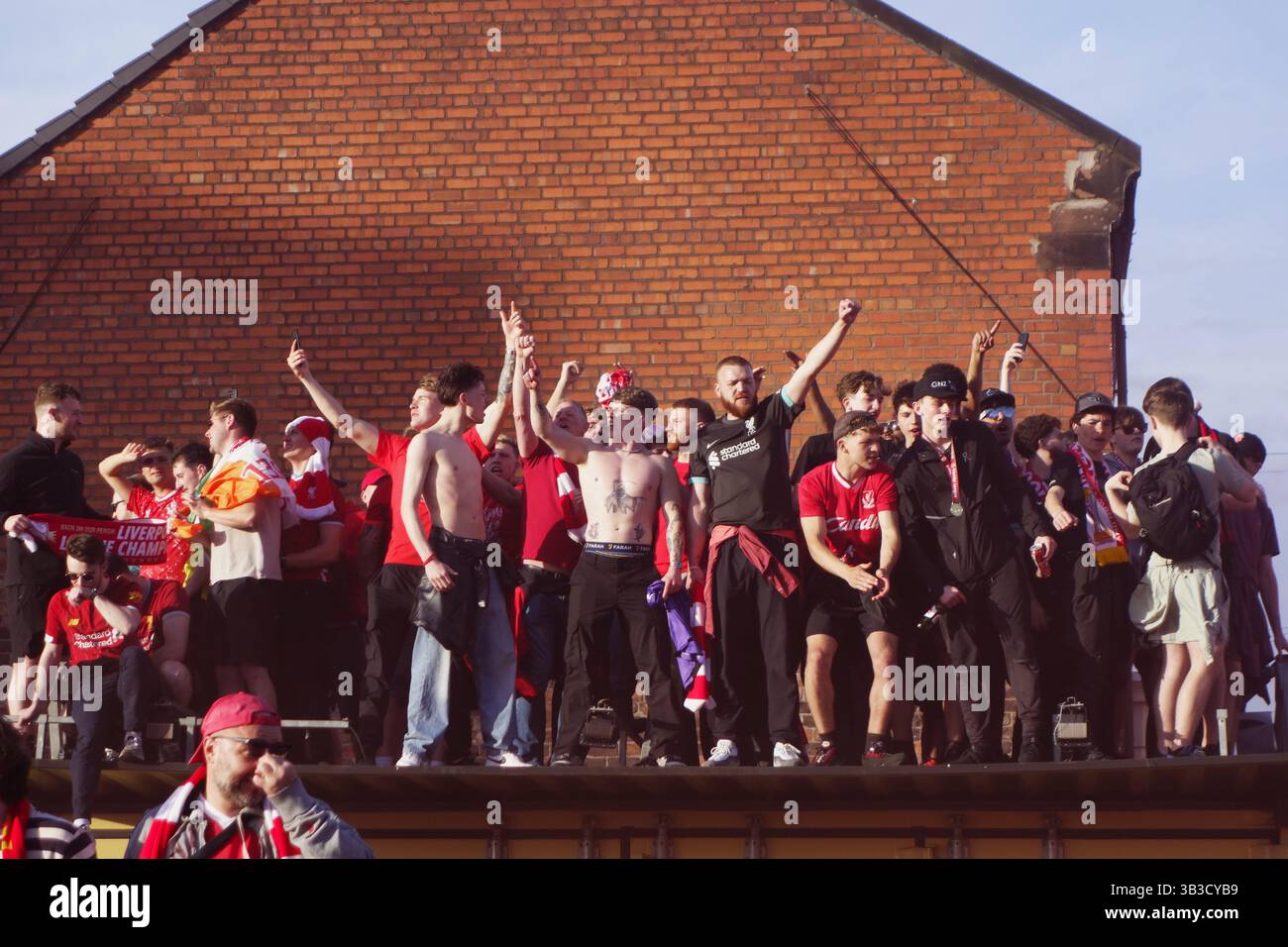 Liverpool fans celebrate winning the Premier League title outside ...