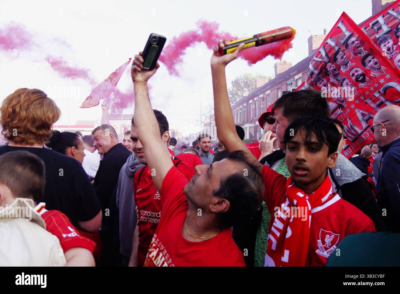 Liverpool fans celebrate winning the Premier League title outside ...
