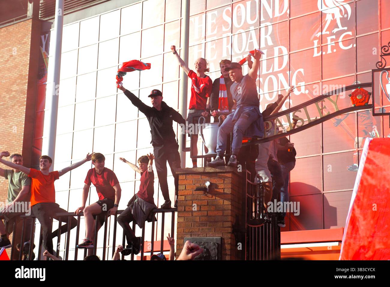 Liverpool fans celebrate winning the Premier League title outside ...