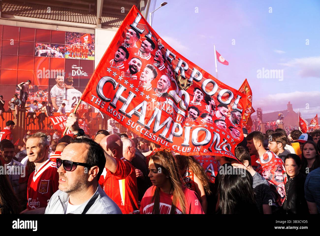 Liverpool fans celebrate winning the Premier League title outside ...