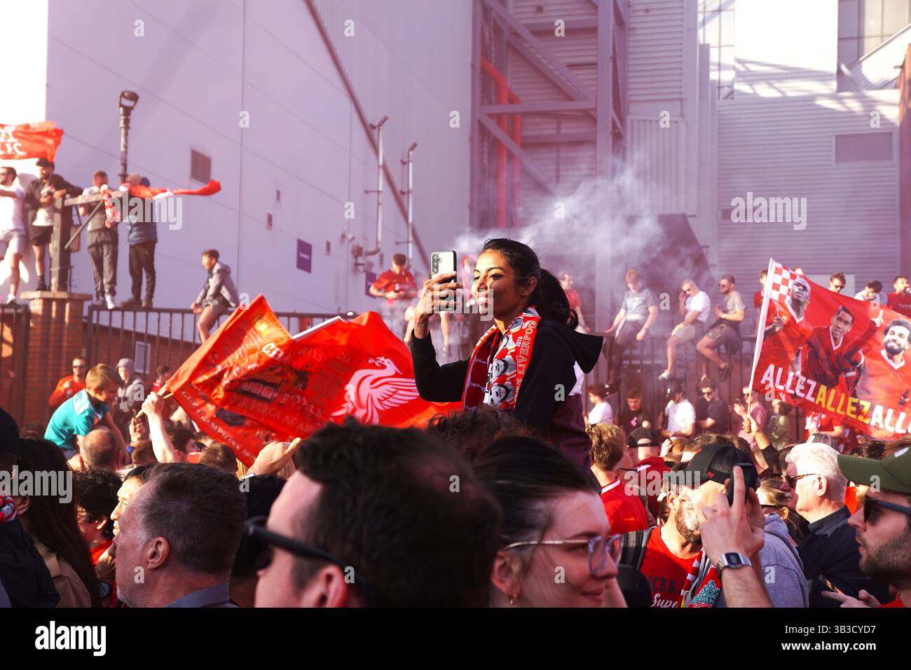 Liverpool fans celebrate winning the Premier League title outside ...