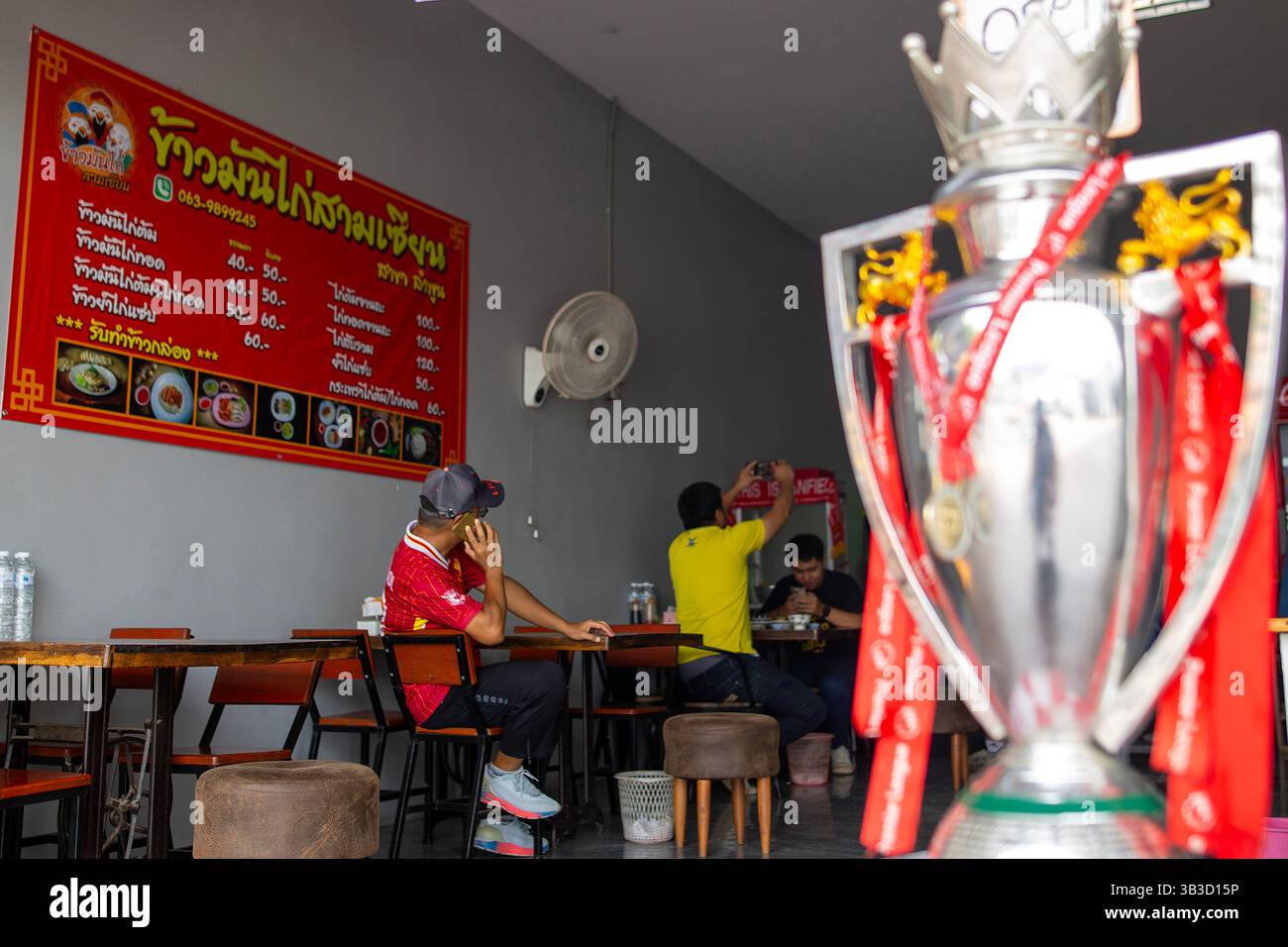 Lamphun, Thailand. 28th Apr, 2025. A Liverpool football fan is seen ...