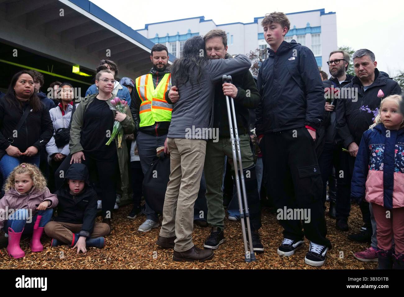 Noel Johansen, center, whose wife Jenifer Darbellay died after a ...