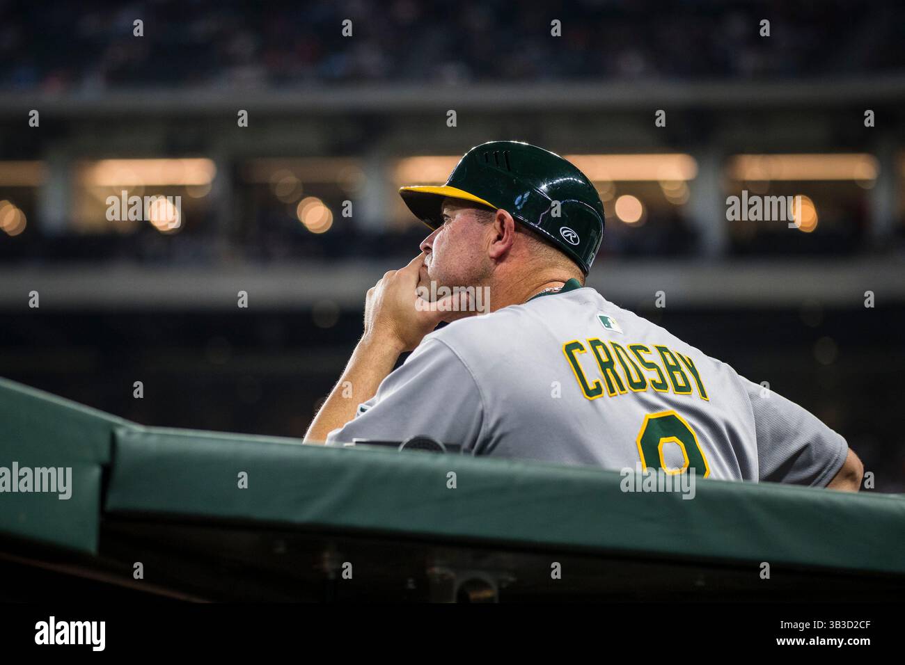 Athletics first base coach Bobby Crosby looks on during the second ...