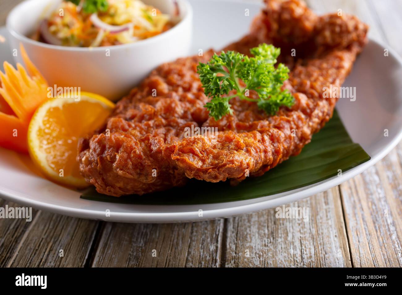 A view of a plate of breaded fish Stock Photo - Alamy