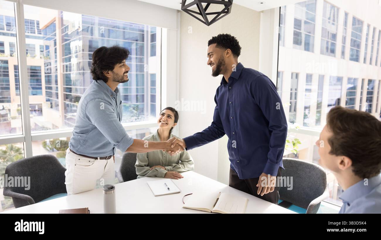 Two businessmen shaking hands, express respect, sealing deal, finalizing agreement Stock Photo ...