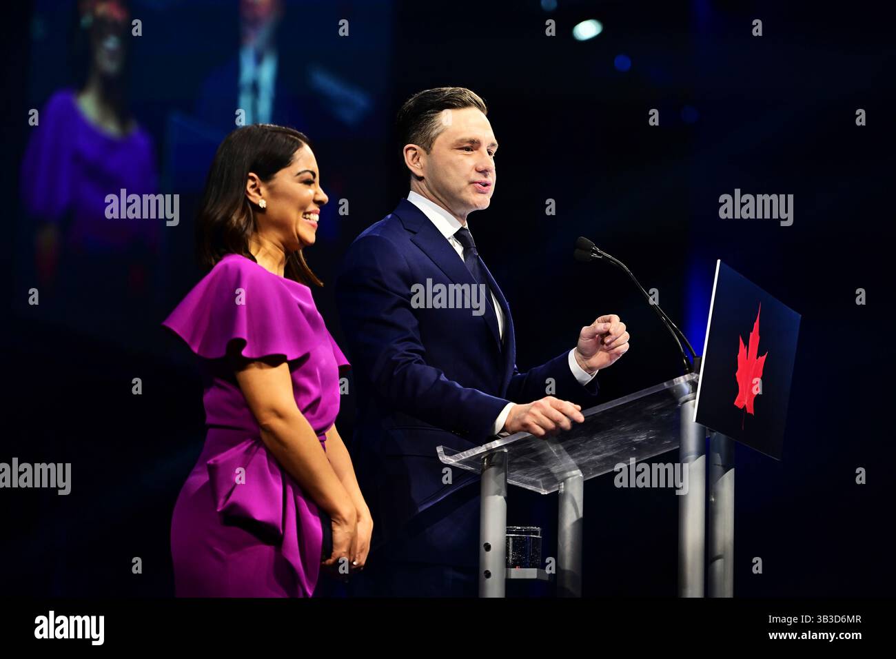 Conservative Leader Pierre Poilievre speaks to supporters with his wife ...