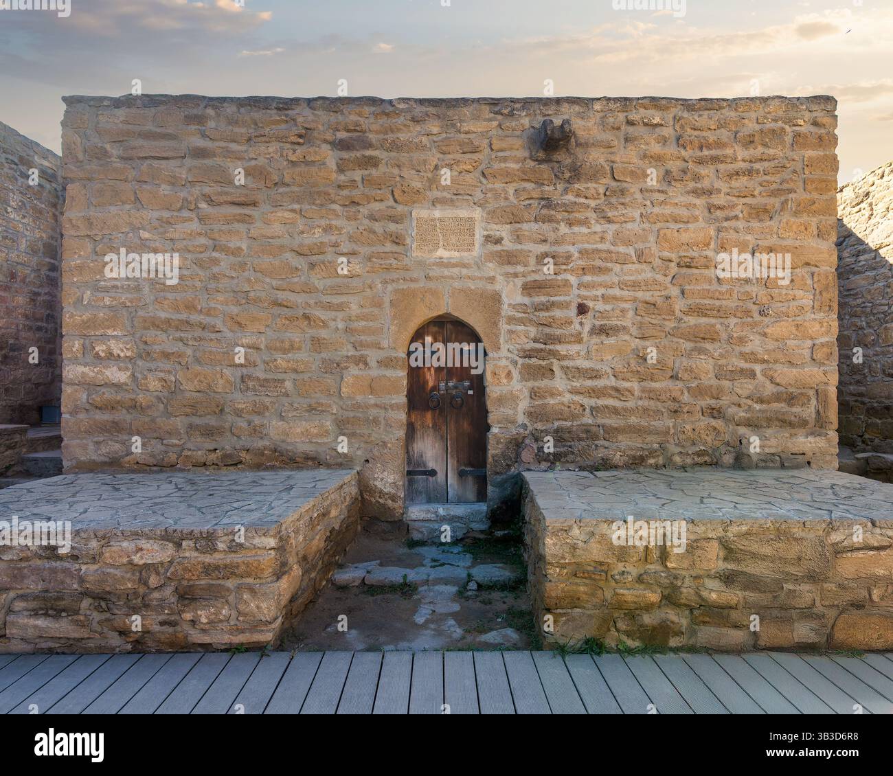 Ancient stone walls and door at the courtyard of Ateshgah, or fire ...