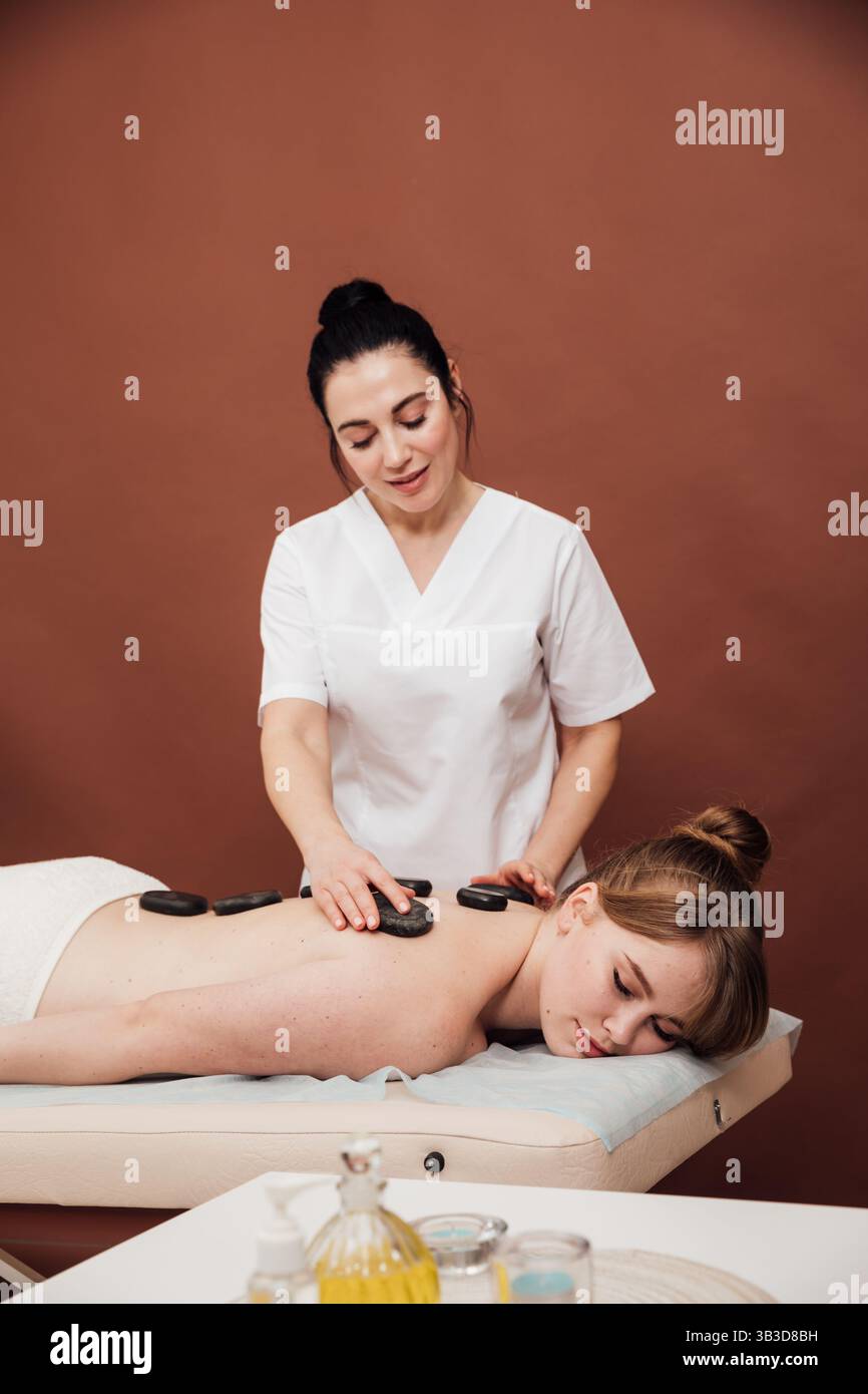 Doctor massage therapist gives hi-res stock photography and images - Alamy