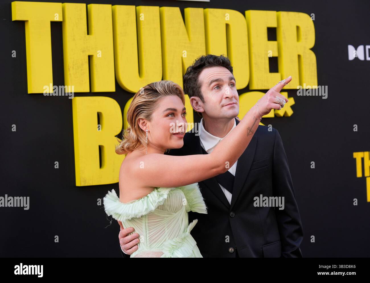 Florence Pugh, left, and director Jake Schreier pose together at the ...