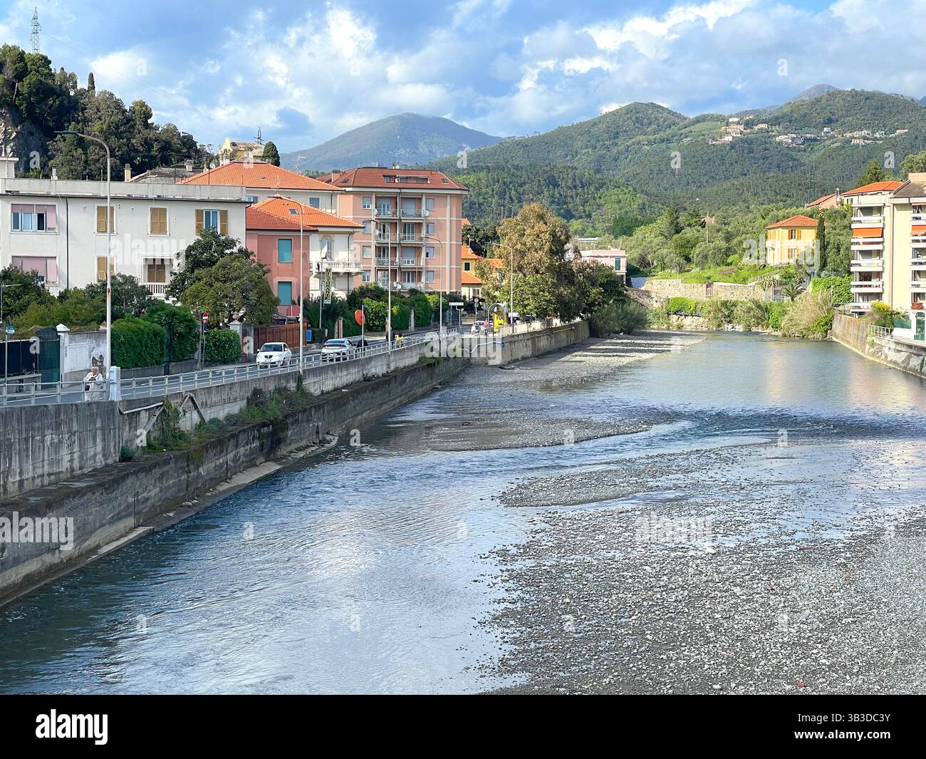 Mountain river, traditional buildings in town of Italy. Tourism and ...