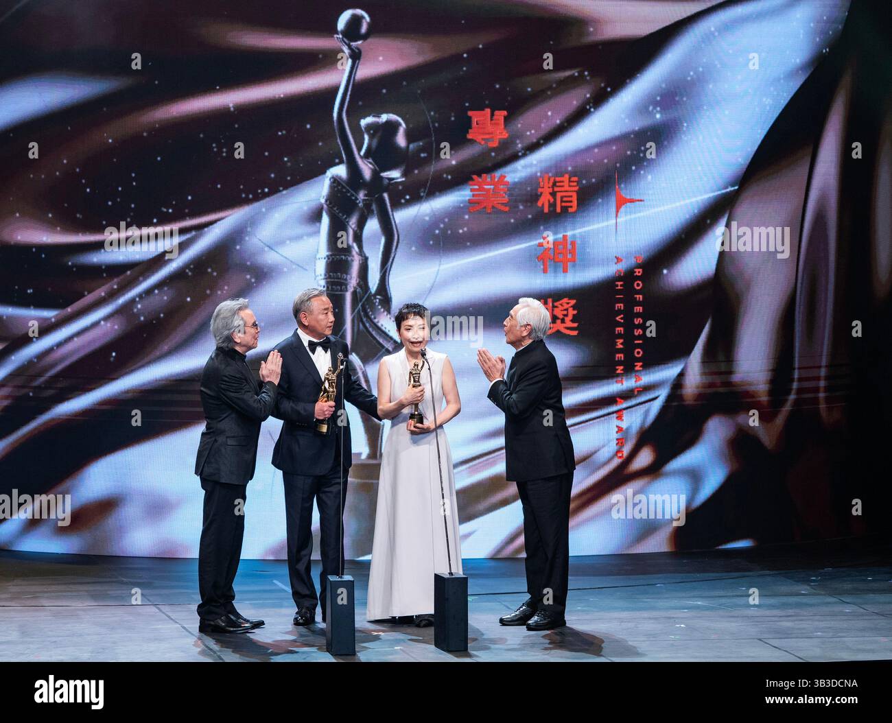 Hong Kong’s voice actress Han Dongqing (R, 2nd) and voice actor Jiang ...