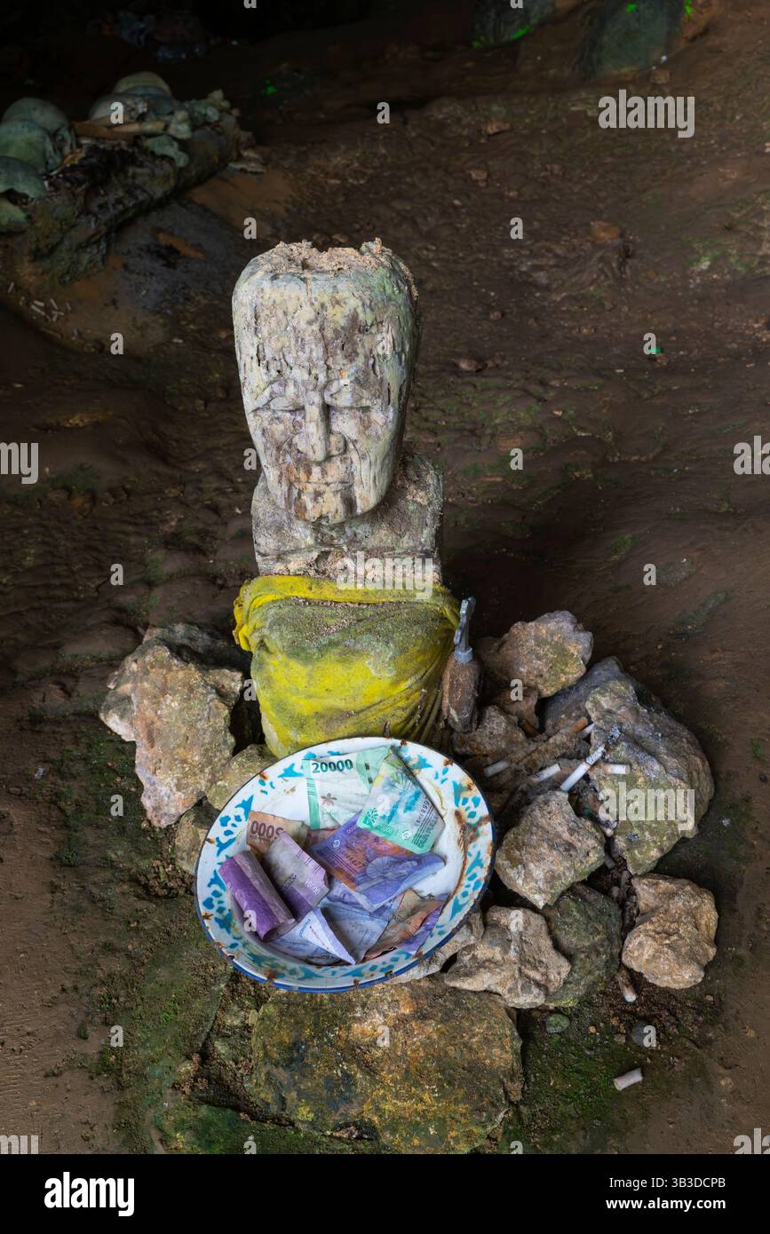 A small monument with gifts for the deceased in cave at Traditional ...