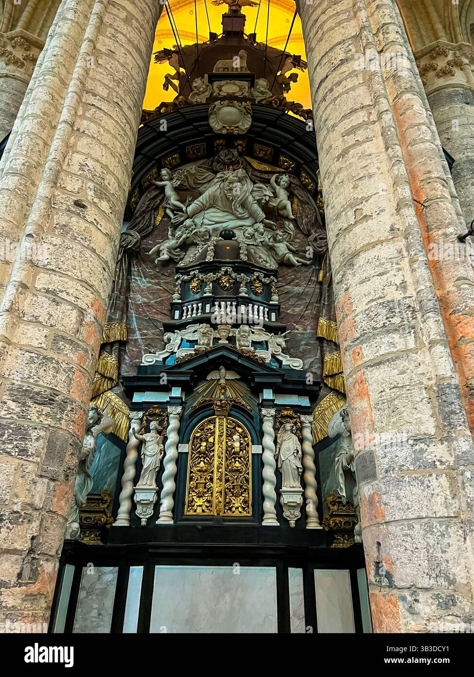 Magnificent golden and black altar surrounded by historical gilded ...