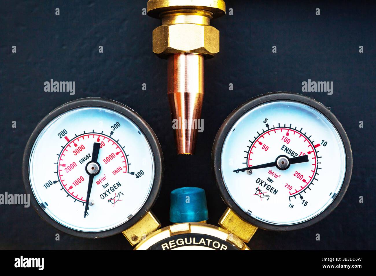 The upper part of the torch with a copper tip and the pressure ...