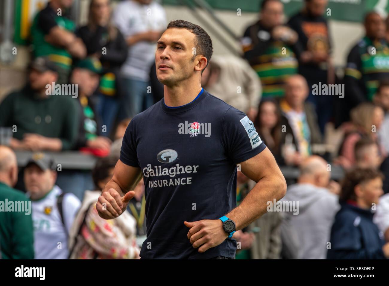 Northampton, UK, 26th April 2025 Referee Adam Leal stretches and warms ...