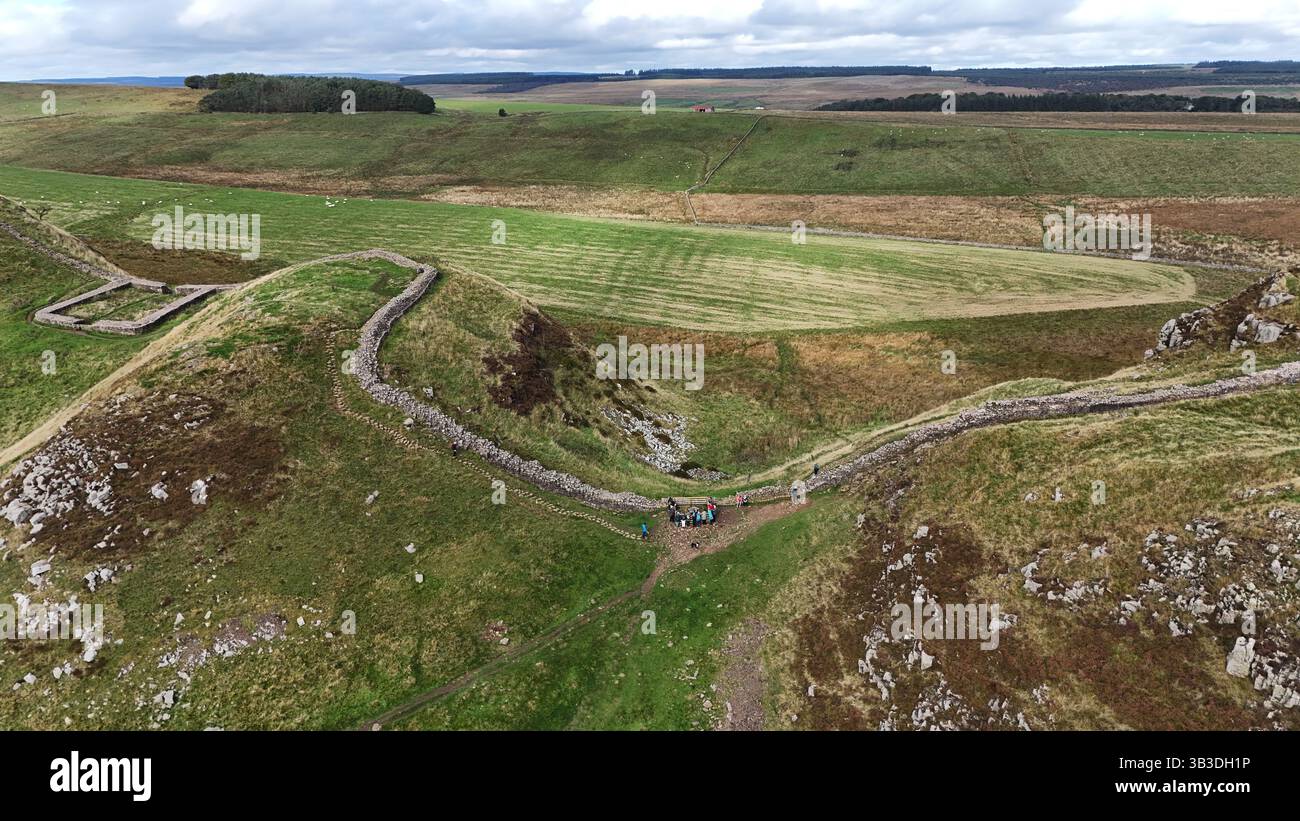File photo dated 25/09/24 of people gathering around the stump of the ...