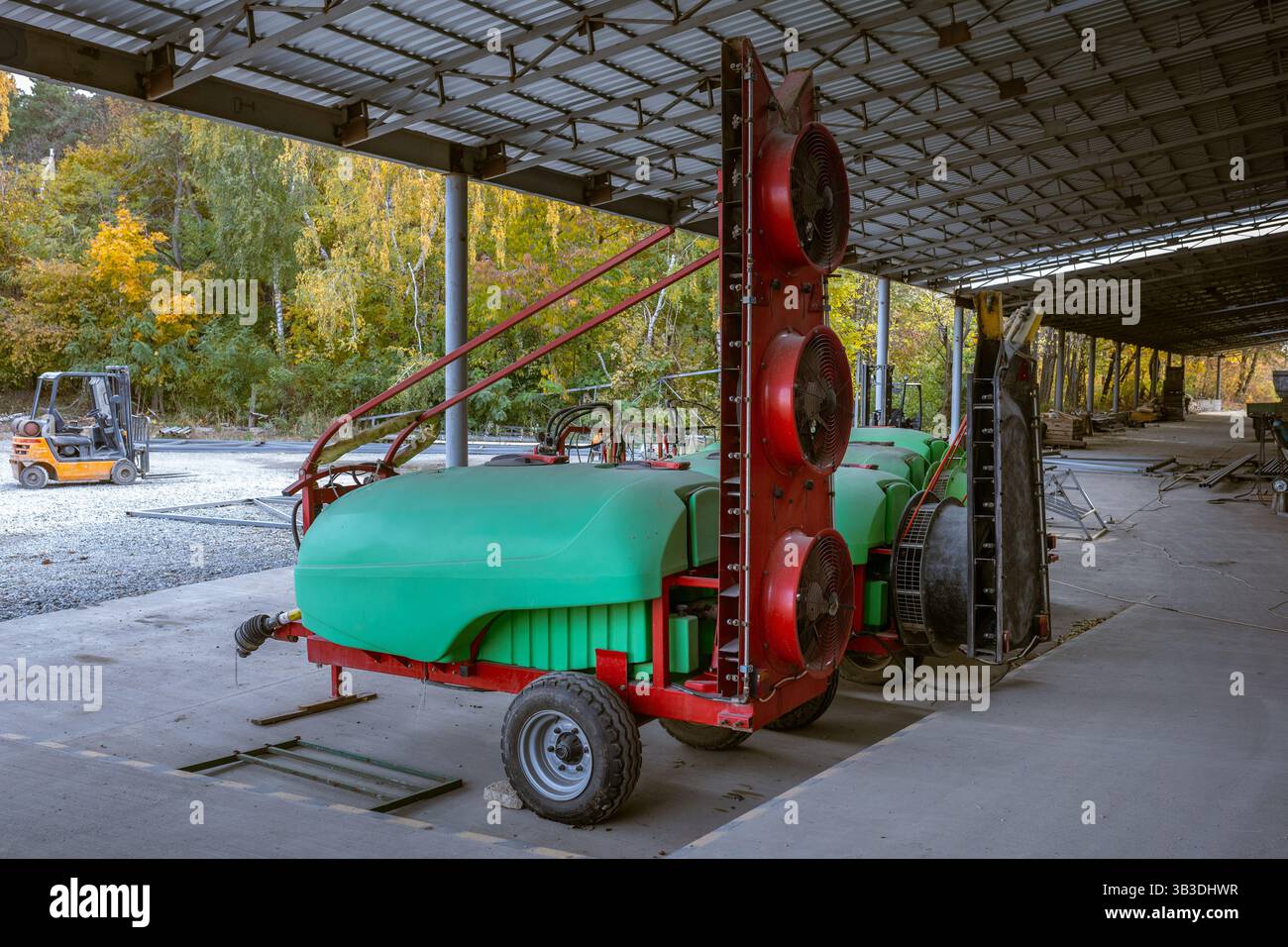 Trailed orchards sprayer, equipped with a counter-rotating fan. The ...