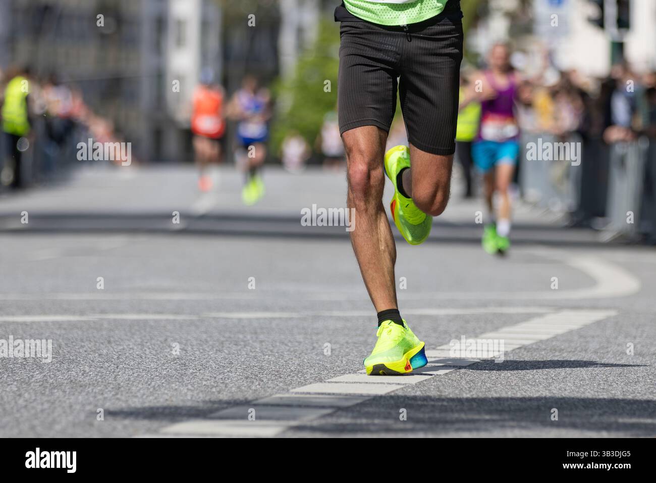 Legs of a male marathon runner with underpronation Stock Photo - Alamy