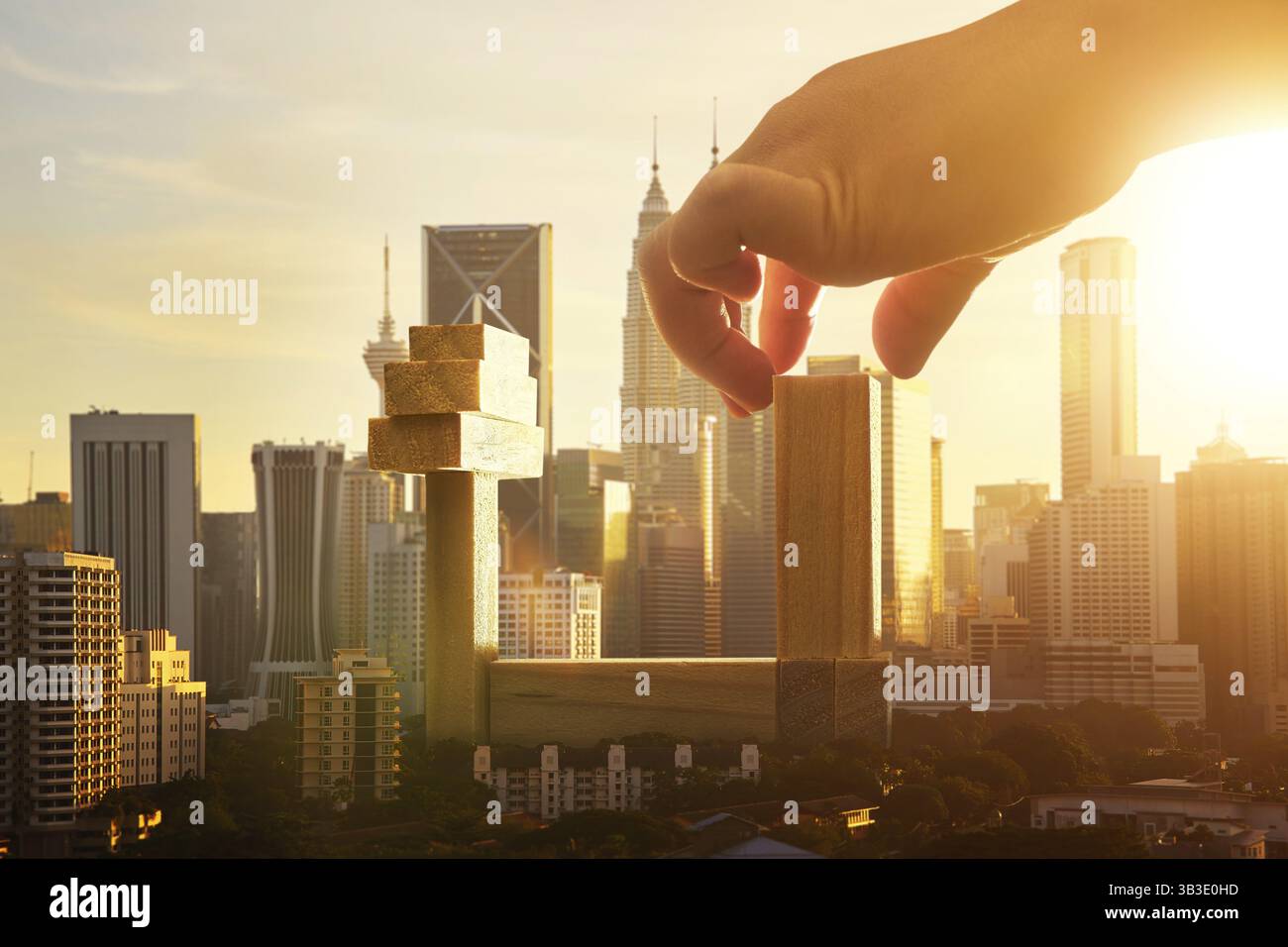 Unknown hand build a wooden blocks tower in downtown . Learning, real ...