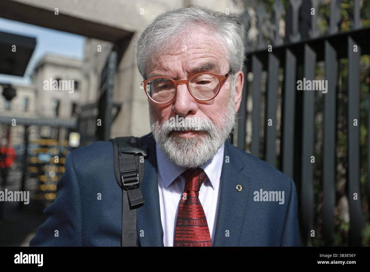 Former Sinn Fein president Gerry Adams outside the High Court in Dublin ...
