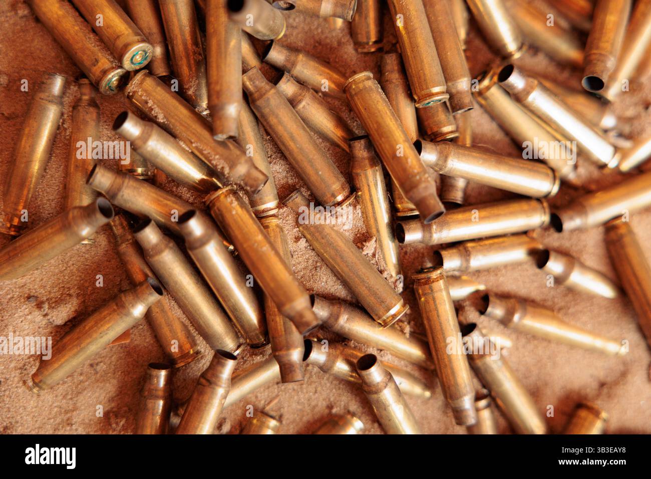 Many Empty 9mm bullet casings Stock Photo - Alamy