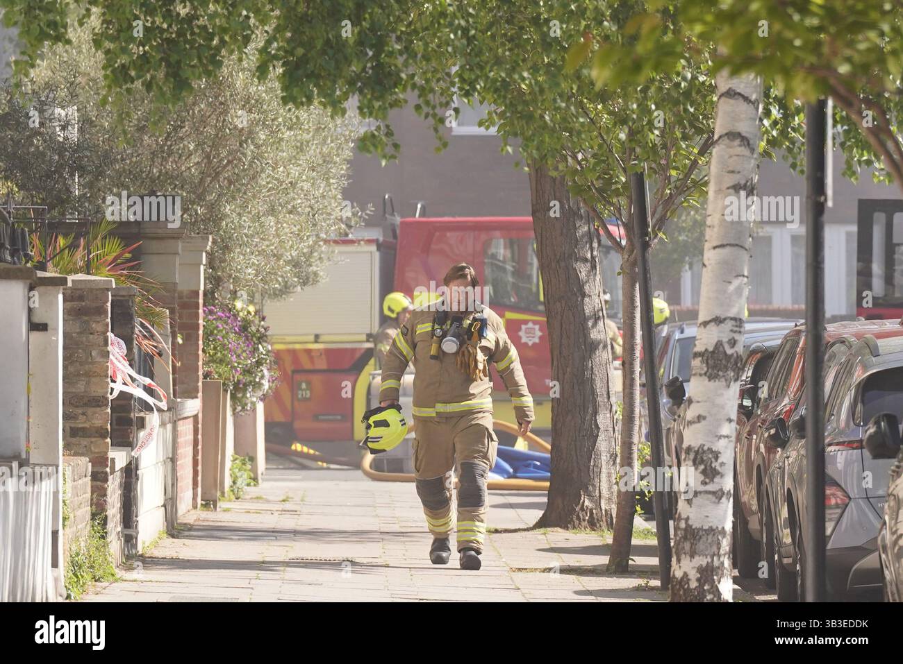 Emergency services at the scene of a fire at an electrical substation ...