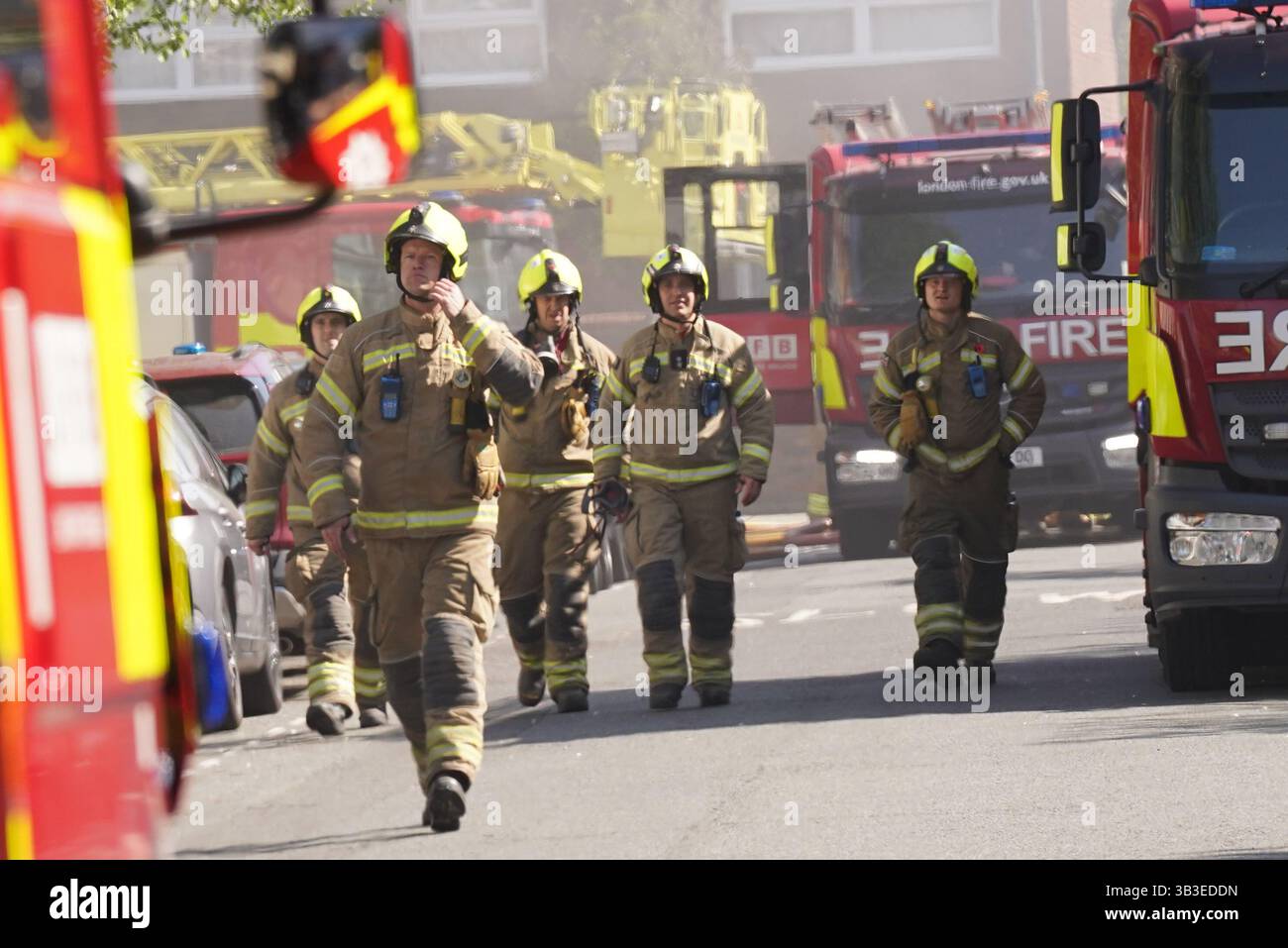 Emergency services at the scene of a fire at an electrical substation ...