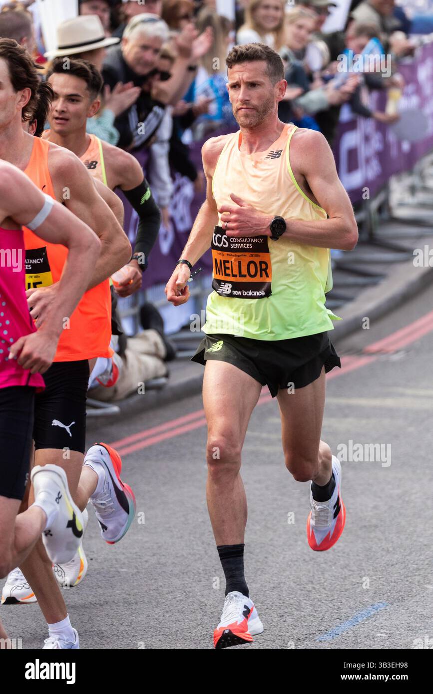Jonathan Mellor, elite male athlete competing in the 2025 TCS London Marathon, passing through ...