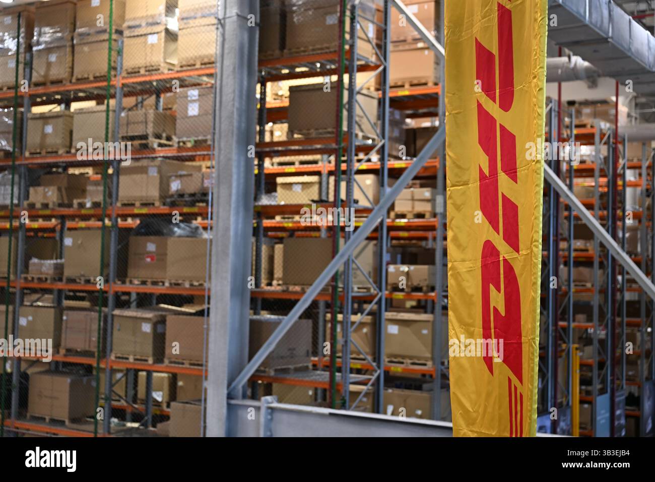 FILED - 25 April 2025, United Arab Emirates, Dubai: The DHL logo hangs ...