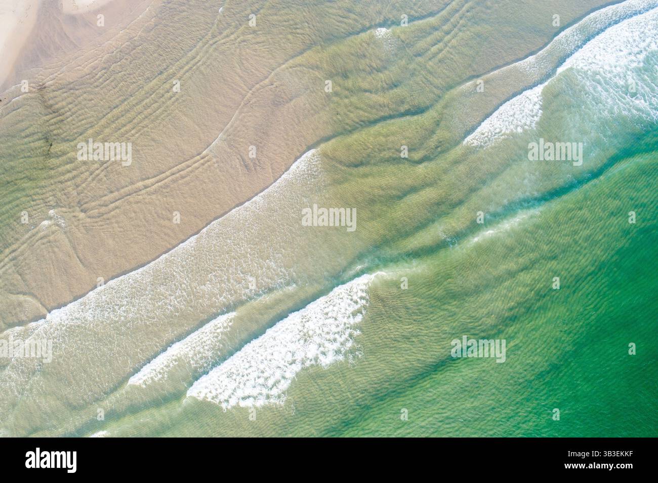 beach coastline aerial perspective breaking wave drone top down ...