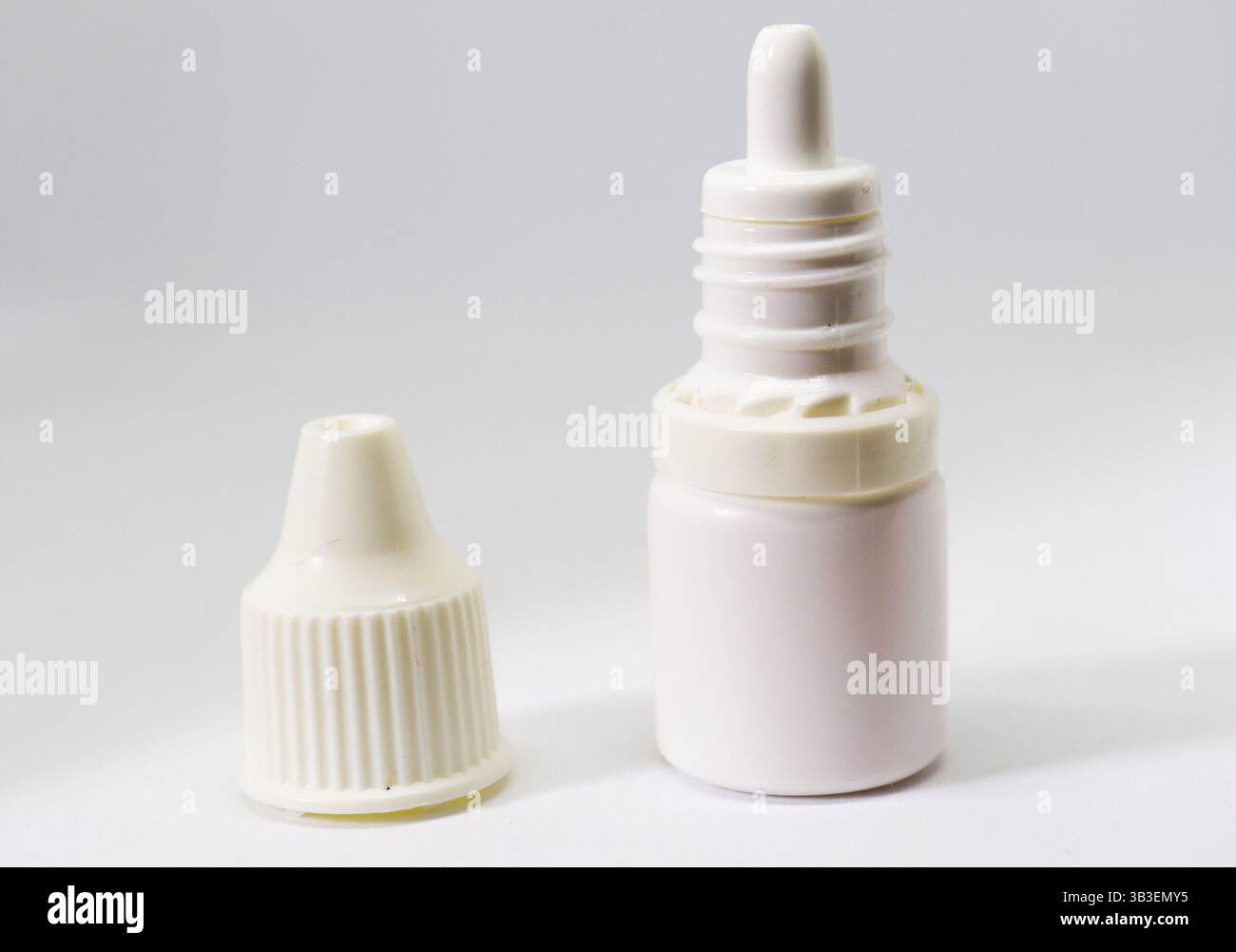 White color plastic drop bottle on white background. Eye dropper bottle ...