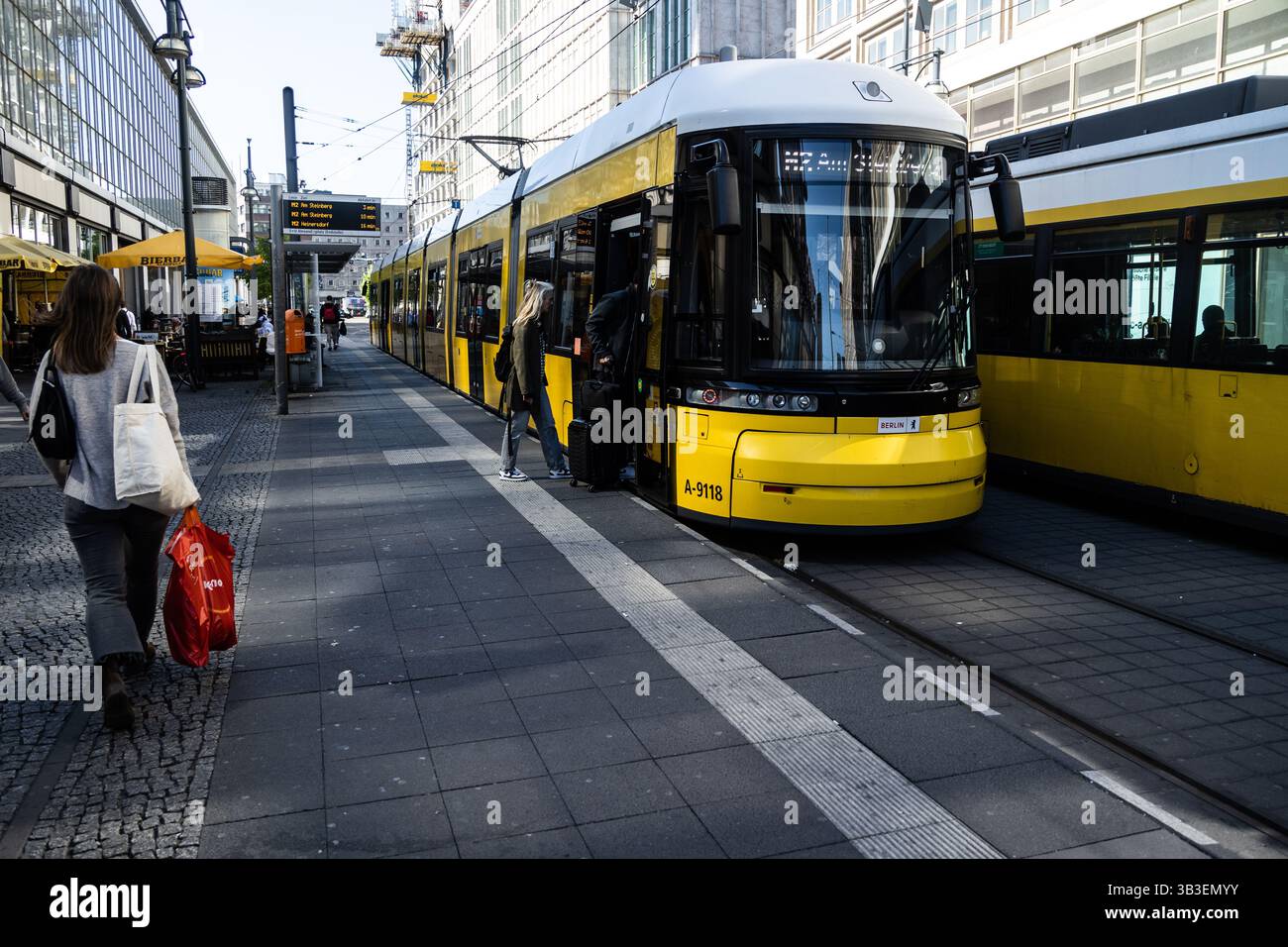Berlin, Germany. 26th Apr, 2025. Passengers enter a tram at ...